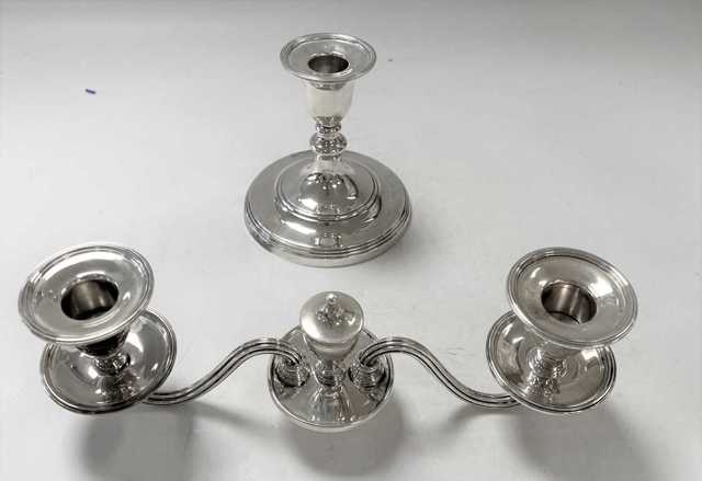 A visual pair of Elizabeth II silver two light metamorphic candelabra ...