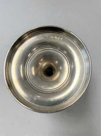 A visual pair of Elizabeth II silver two light metamorphic candelabra ...