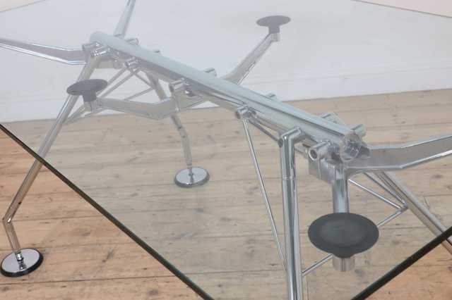 A Nomos glass desk by Norman Foster on artnet