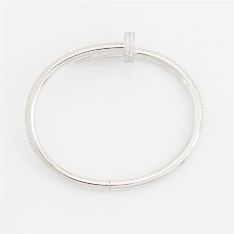 A Cartier Juste en Clou bracelet in 18K white gold set with round ...