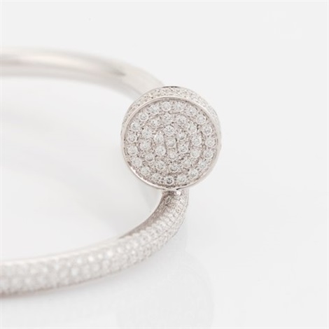 A Cartier Juste en Clou bracelet in 18K white gold set with round ...