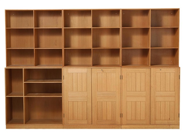 A solid oak wall unit, consisting of two cabinets, four bookcases of ...