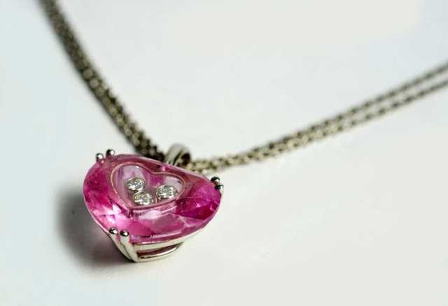 Chopard So Happy Diamond a diamond and synthetic pink sapphire pendant ...
