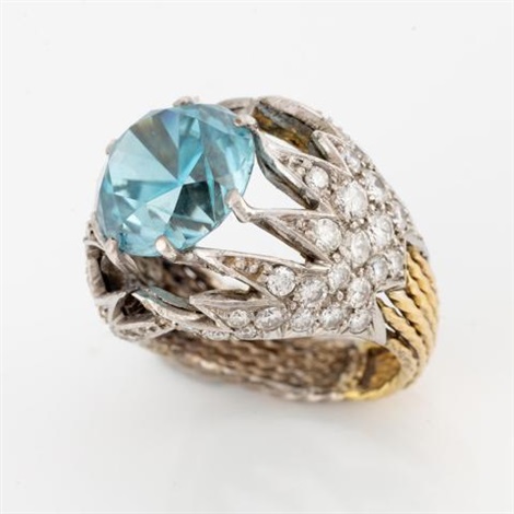 A Sterlé ring in 18K gold and platinum with a blue faceted zircon by ...
