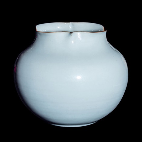 Celadon vase in bulbous shape with pinched points and tapered openings ...