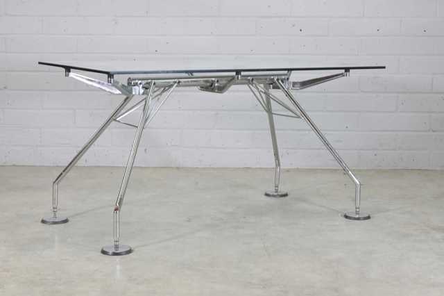 A Nomos glass desk by Norman Foster on artnet