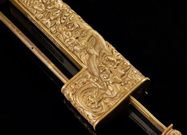 A RARE IMPERIAL GILT-BRONZE CABINET LOCK on artnet