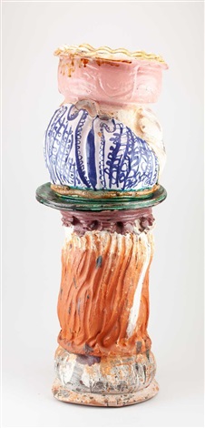 A monumental earthenware pot formed of a stack of different vessel ...