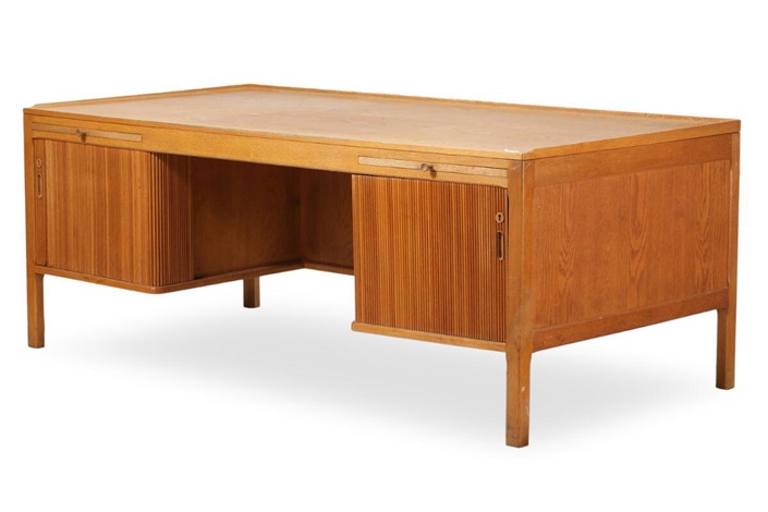 A freestanding oak desk by Hans J. Wegner on artnet