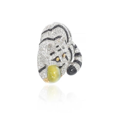 Cartier. Cats eye chrysoberyl, onyx and diamond brooch, Ricky, circa ...