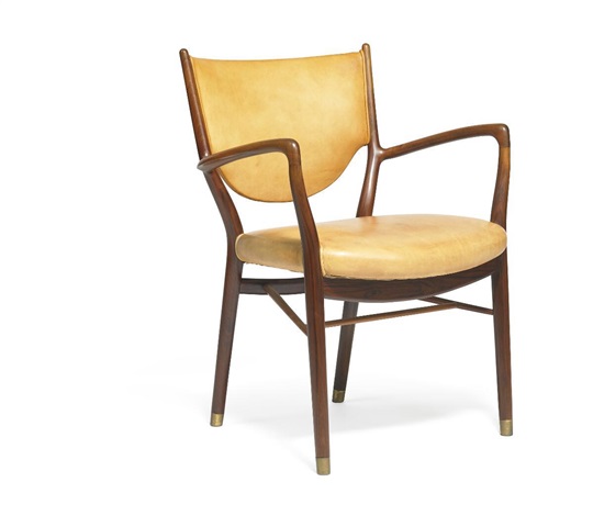 FJ 46 A solid nutwood armchair by Finn Juhl on artnet