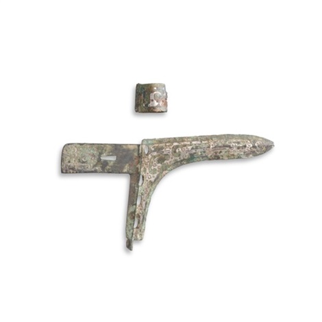 A silver-inlaid bronze dragon and phoenix dagger and finial, Eastern ...