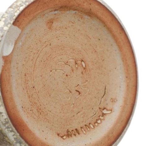 A tall stoneware vase modelled with circular base and oval top by Jacob Eiler and Arne Bang on ...