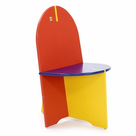 A sculptural chair of red-, yellow- and blue lacquered wood by Torben ...
