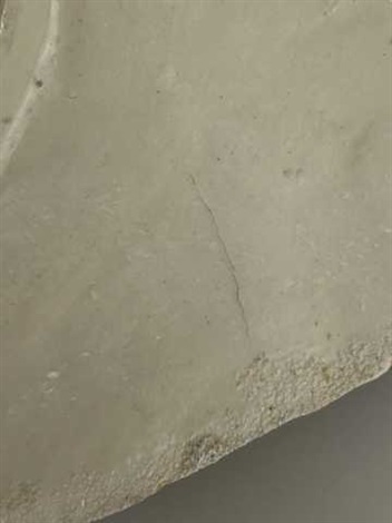 a very large grogged stoneware white water sculpture on a wooden base ...