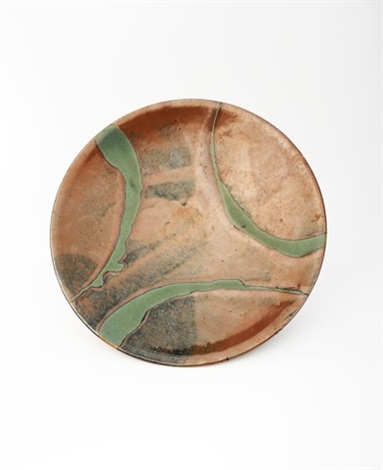 A stoneware charger by Shoji Hamada on artnet