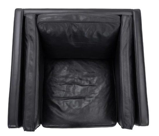 Easy chair with oak legs by Peter Mogensen on artnet