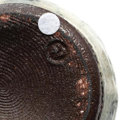 A high-fire earthenware lidded bowl, pitcher and two cups, decorated ...