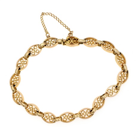 A Russian gold bracelet, design with larger and smaller ovals by Fedor ...