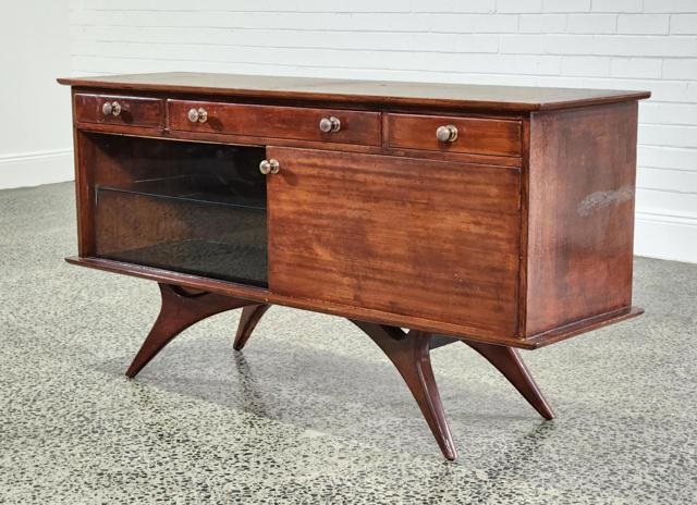 1950s sideboard by Edward Hill, with display section splayed legs by Edward Hill on artnet