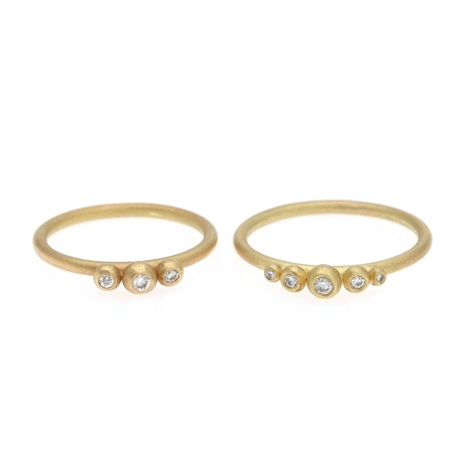 A pair of Diadem diamond rings respectively set with three and five ...