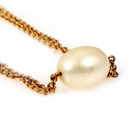 A pearl necklace set with four freshwater cultured pearls and lily of ...