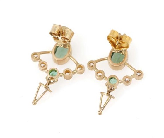 A pair of ear pendants each set with an oval-cut tourmaline, a circular ...