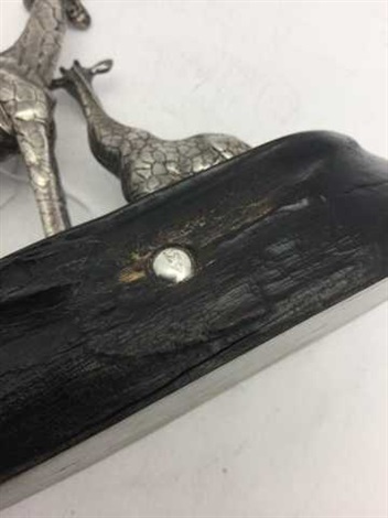 A Pair of Zimbabwean Silver Models of Giraffe by Patrick Mavros on artnet