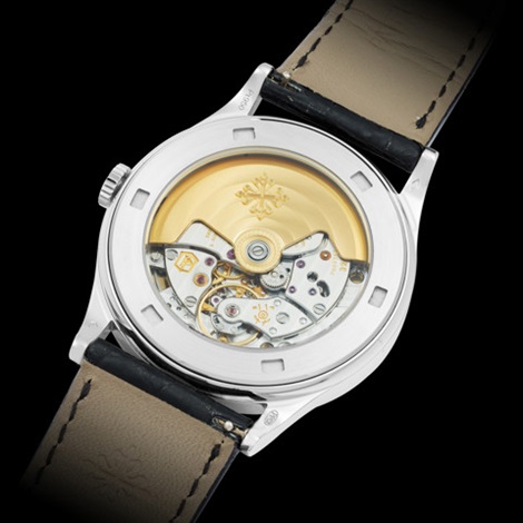 PATEK PHILIPPE. A PLATINUM AND BAGUETTE-CUT DIAMOND-SET AUTOMATIC WRISTWATCH WITH SWEEP CENTRE ...