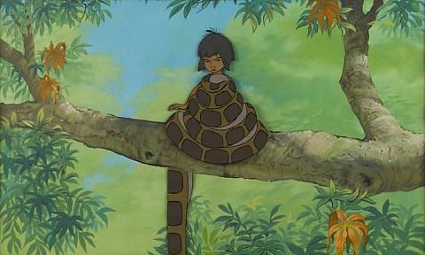 Kaa wrapped around Mowgli on the branch of the tree from The Jungle ...