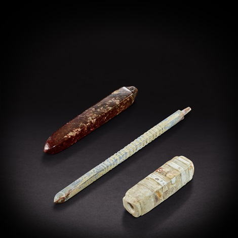 A small calcified jade cong and two jade awl-shaped ornament, Neolithic ...