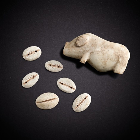 Six white jade shell beads and a white jade pig, Han dynasty on artnet