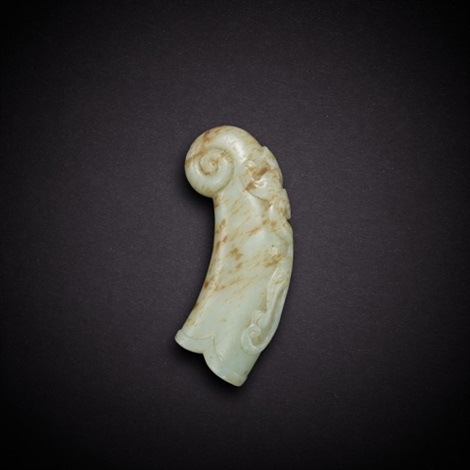 A white and russet jade ram and a pale celadon jade chilong dagger ...