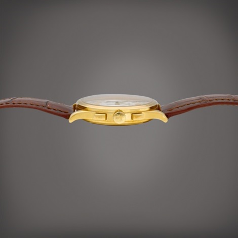Patek Philippe Reference 5170 A yellow gold chronograph wristwatch with ...