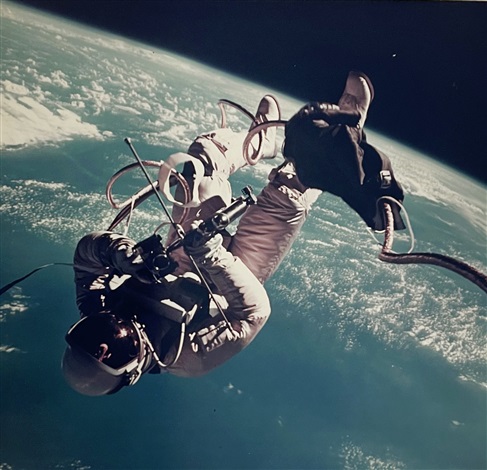 First US spacewalk, Ed White photographing the spacecraft during his ...