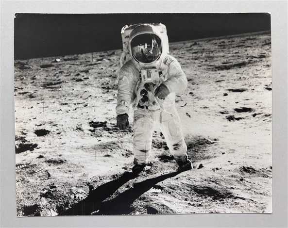 Buzz Aldrins sun visor reflects Neil Armstrong and the Lunar Module ...