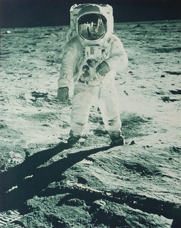 Apollo 11. astronaut edwin aldrin walks on lunar surface near leg of ...