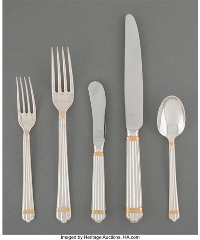 A Fifty-Eight-Piece Christofle Aria Gold Pattern Partial Gilt Silver ...