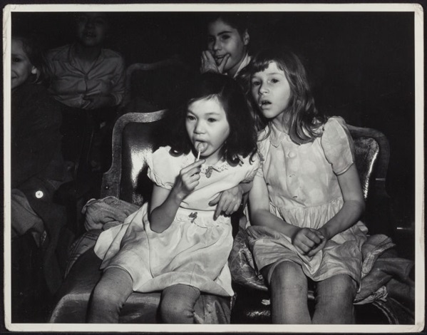 Palace Theatre two girls, one with a lollipop by William Weegee on artnet